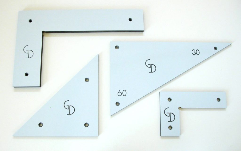 Use 45 degree triangle to check for a 45 degree angles in mitered corners.